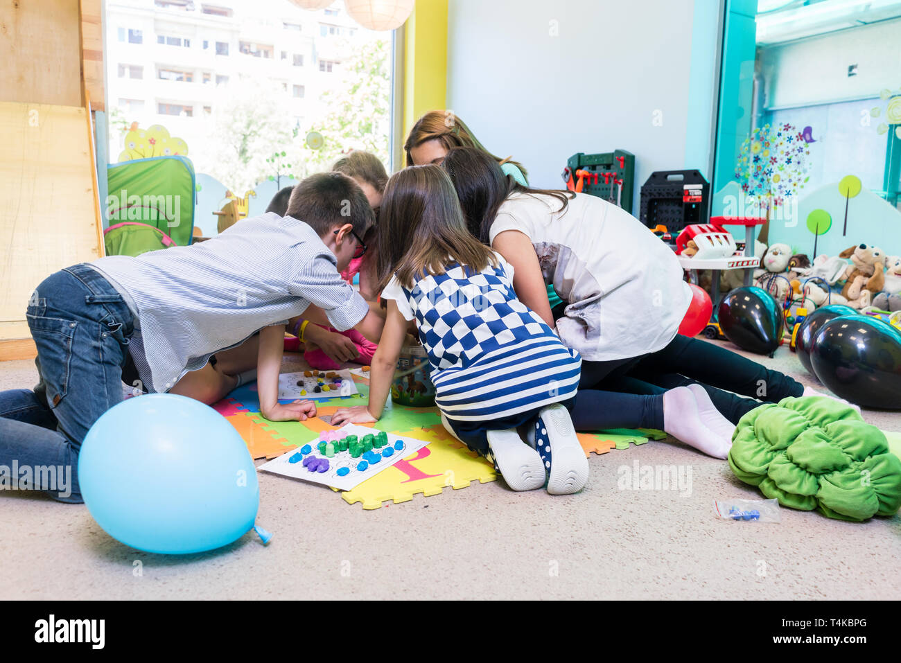 Group of pre-school children during educational activity Stock Photo ...