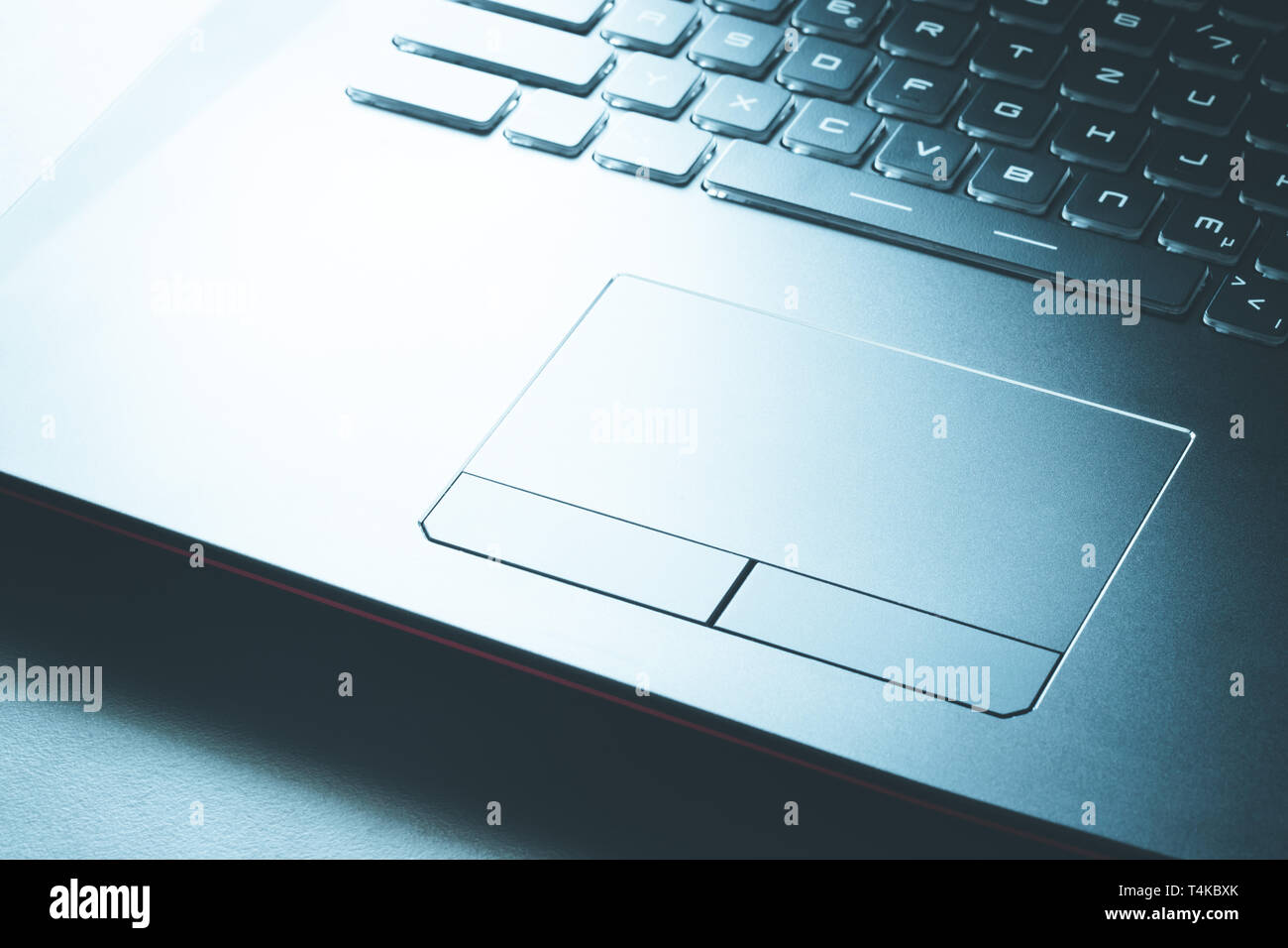 Closeup picture of a black laptop keyboard and touchpad Stock Photo - Alamy