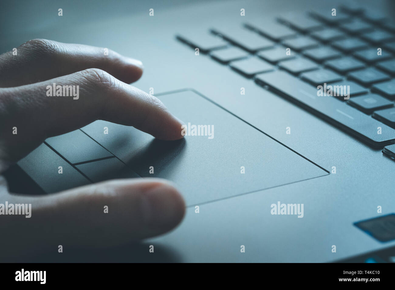 Close up picture of hands using a notebook touchpad Stock Photo - Alamy