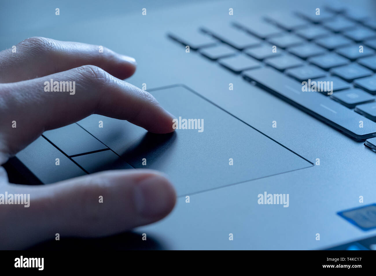 Close up picture of hands using a notebook touchpad Stock Photo - Alamy