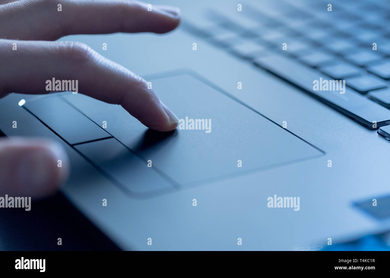Close up picture of hands using a notebook touchpad Stock Photo - Alamy