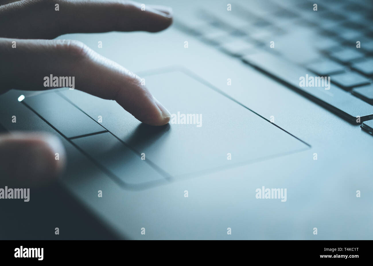 Close up picture of hands using a notebook touchpad Stock Photo - Alamy