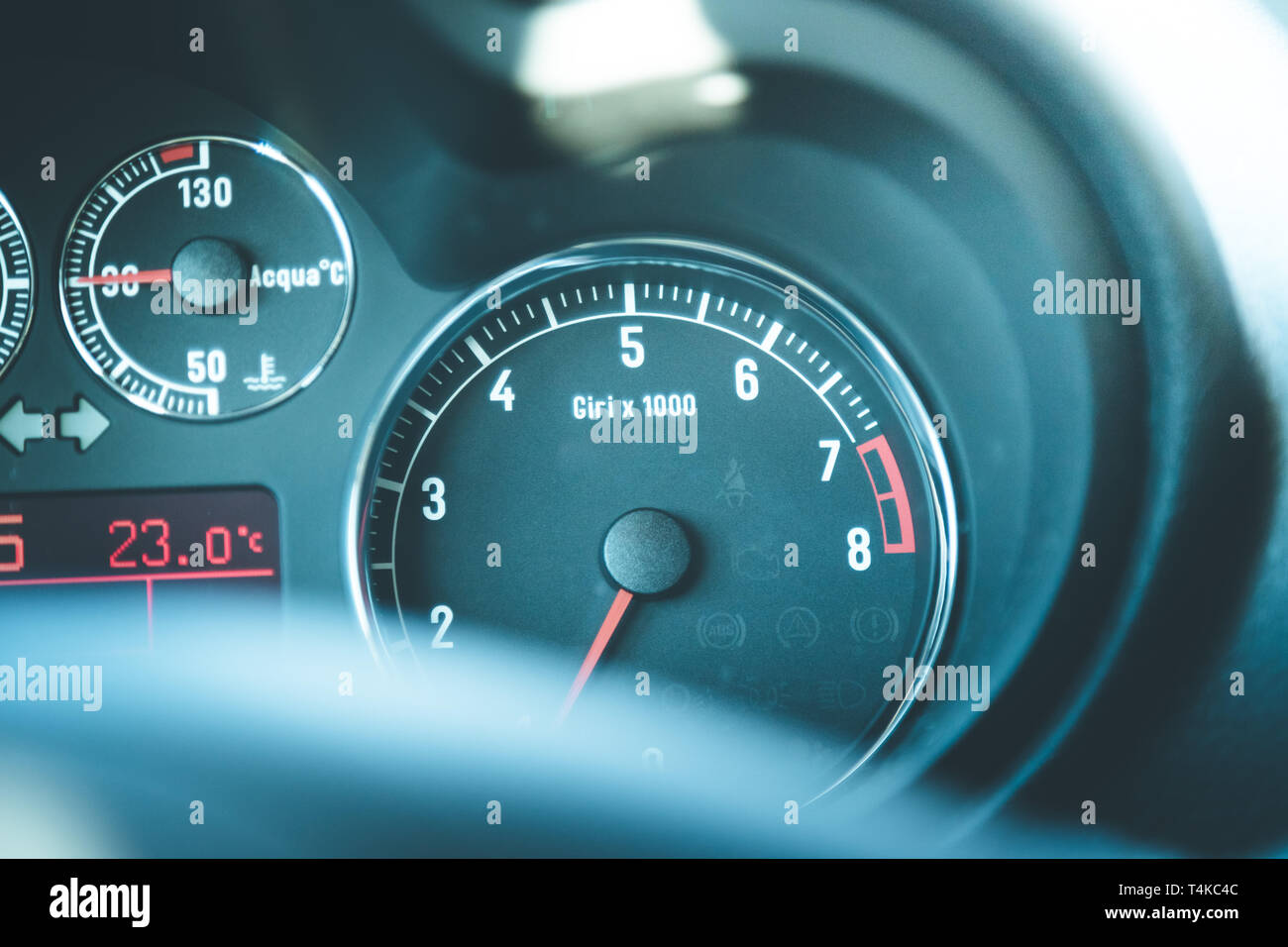 Closeup of the dashboard of a sports car, tachometer and fuel indicator ...