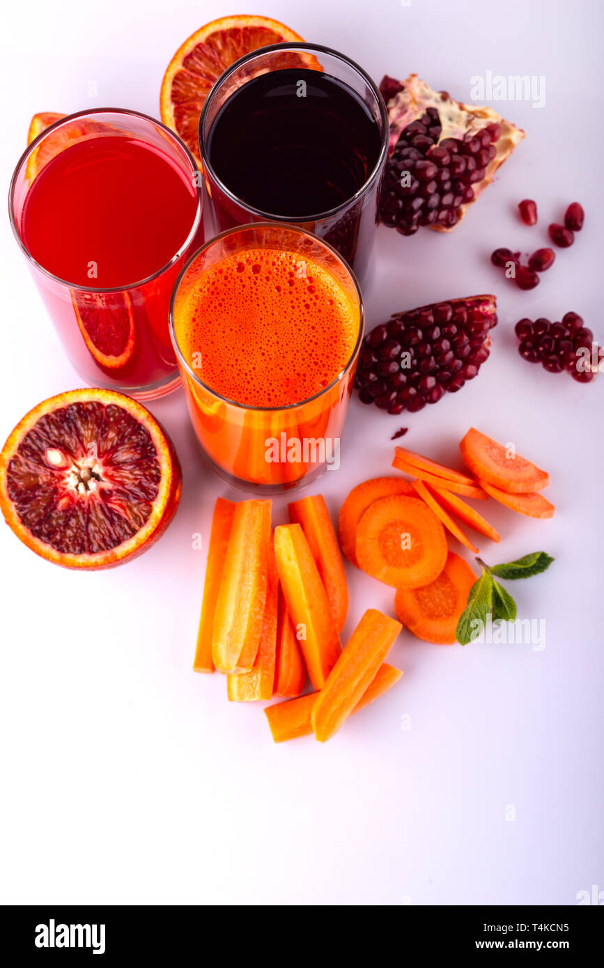 Bottles with different colorful juices. Healthy lifestyle Stock Photo ...