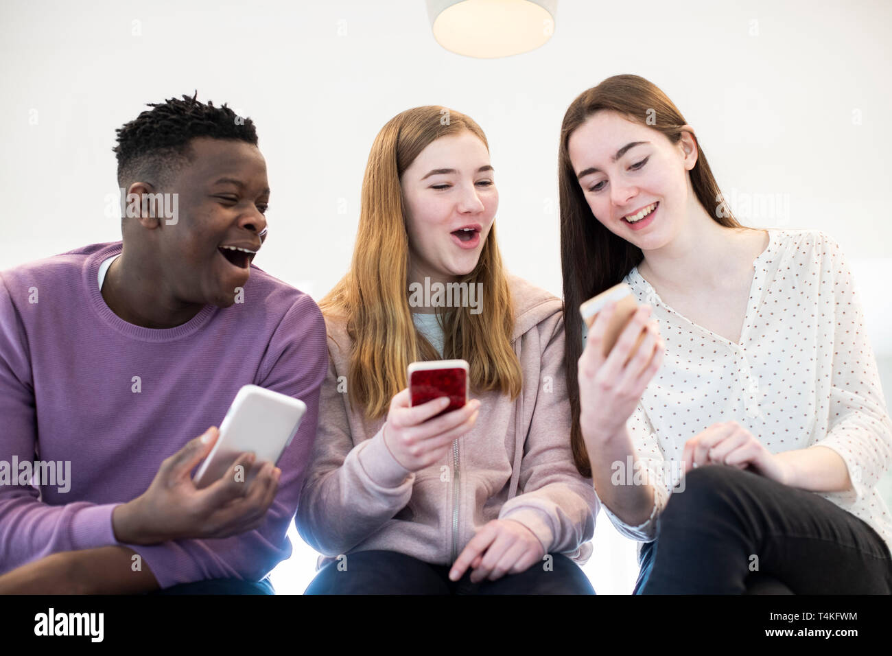 Three teen friends having fun hi-res stock photography and images - Alamy
