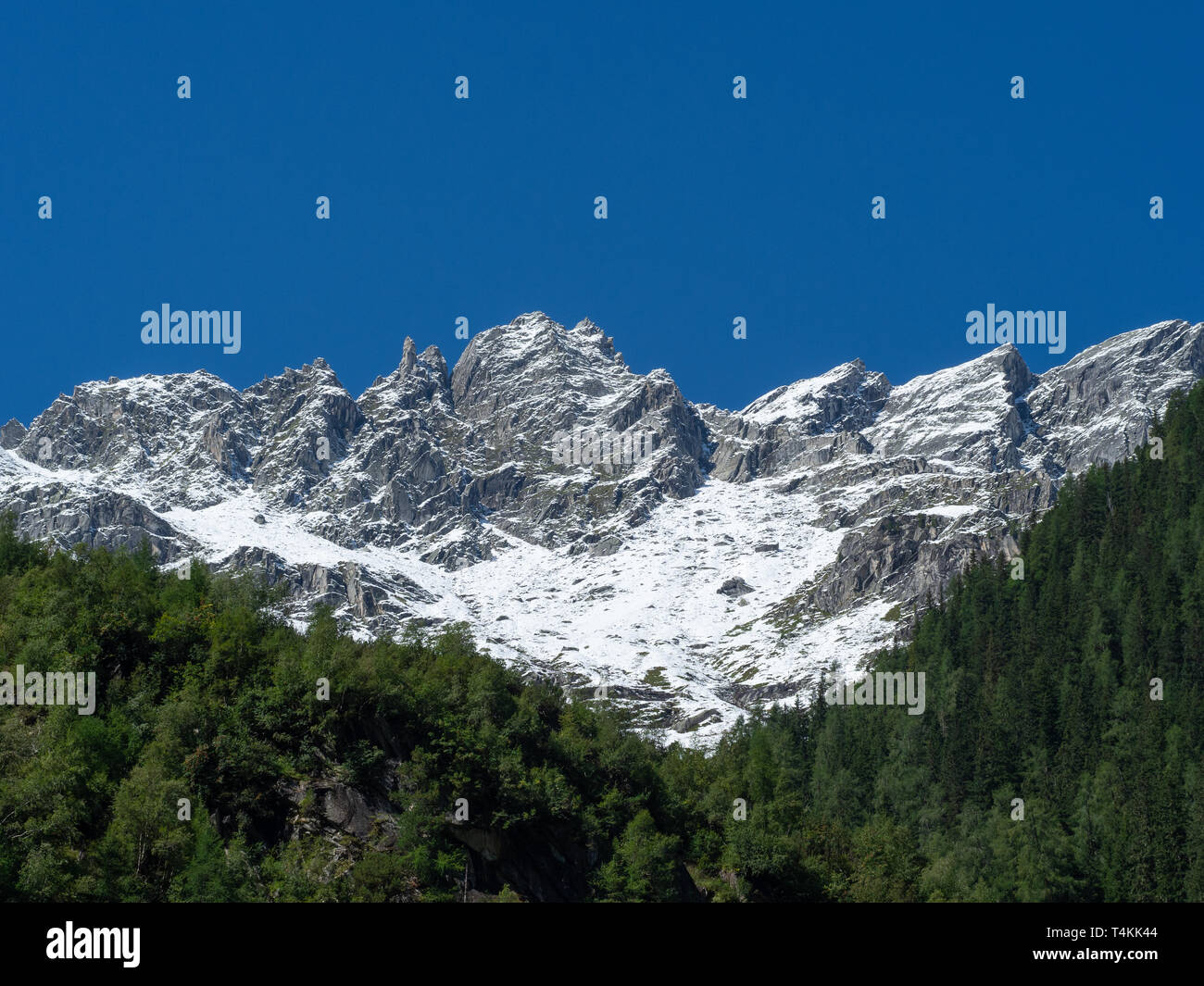 Mountain range with snow Stock Photo - Alamy