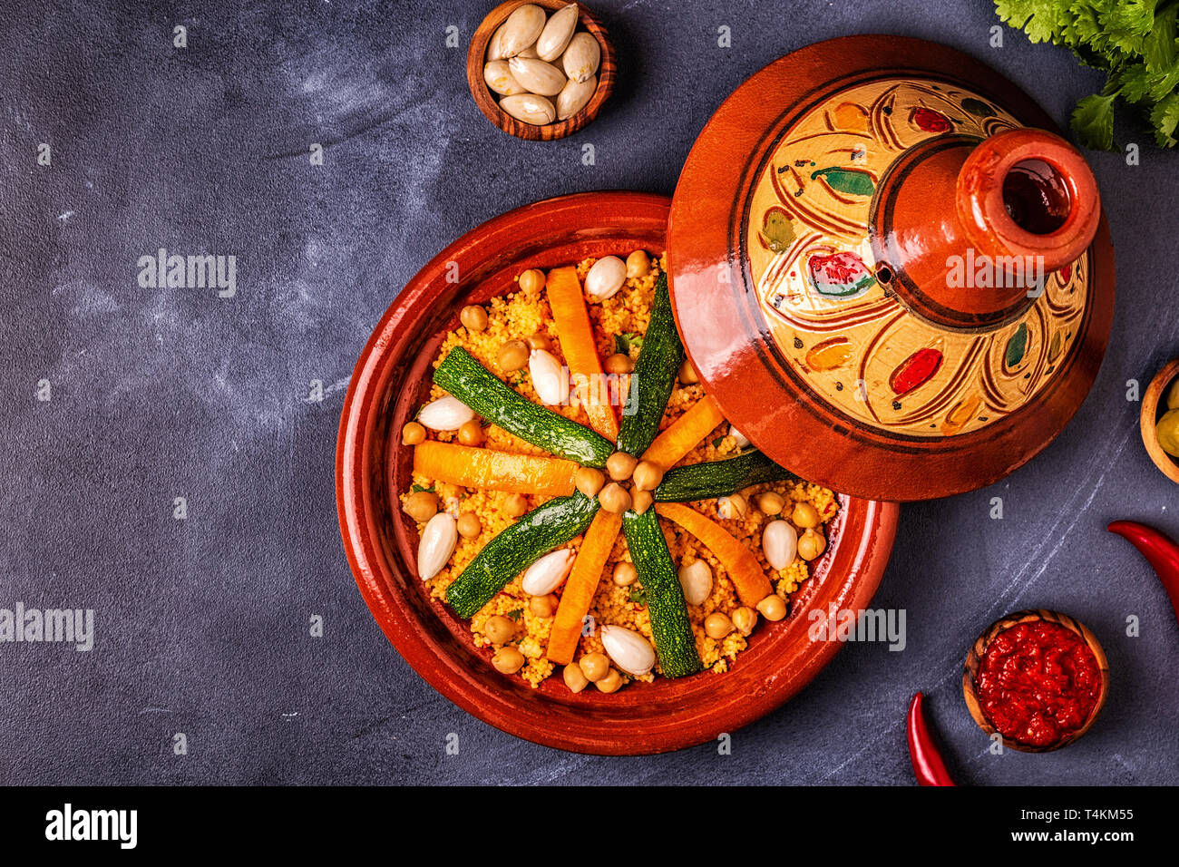 Vegetable tagine with almond and chickpea couscous, top view Stock ...