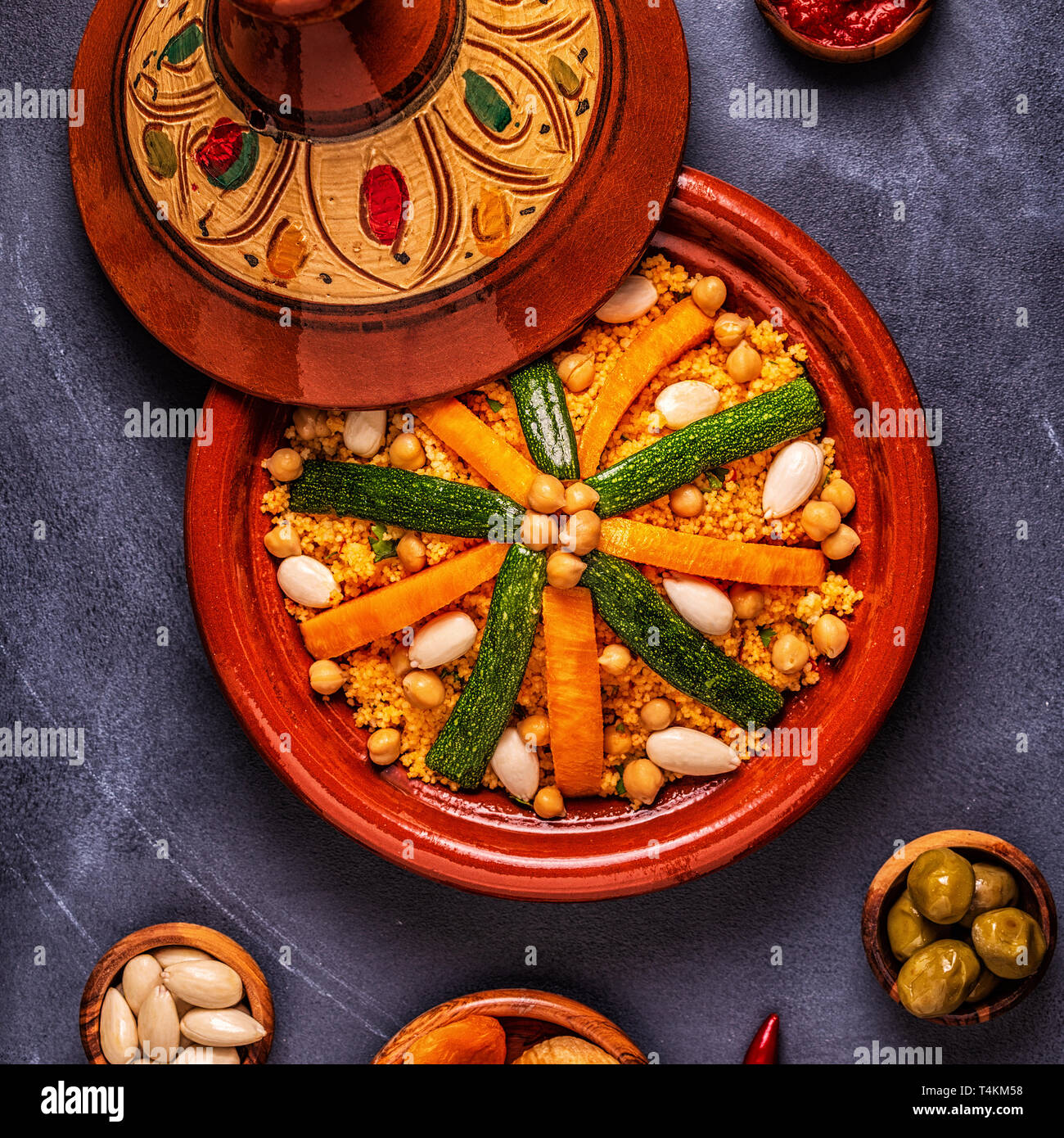 Vegetable tagine with almond and chickpea couscous, top view Stock ...