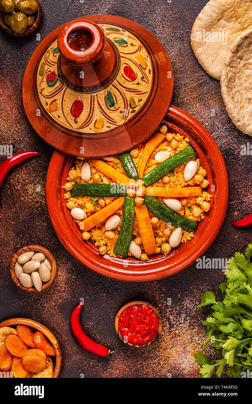 Vegetable tagine with almond and chickpea couscous, top view Stock ...