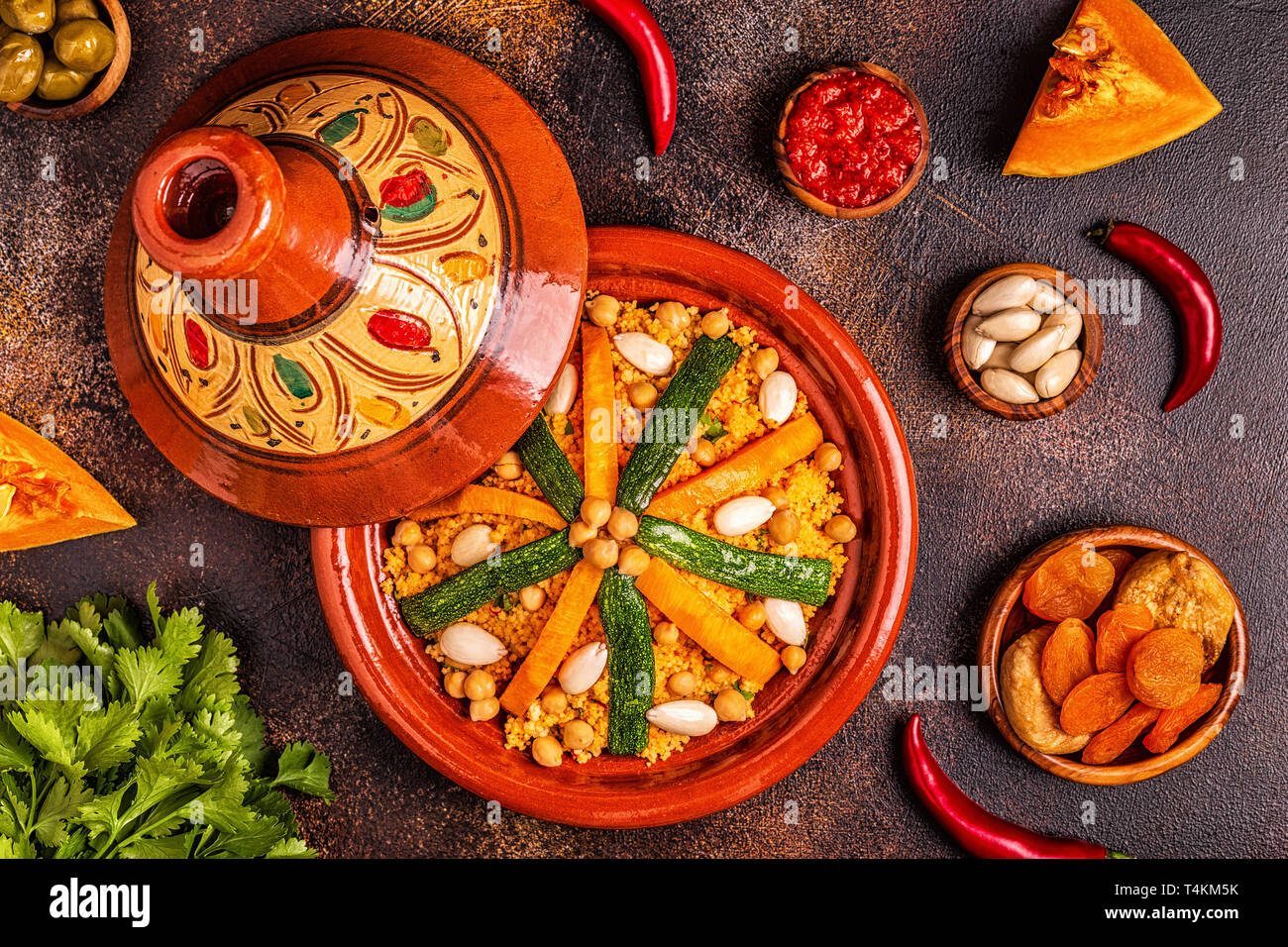 Vegetable tagine with almond and chickpea couscous, top view Stock ...