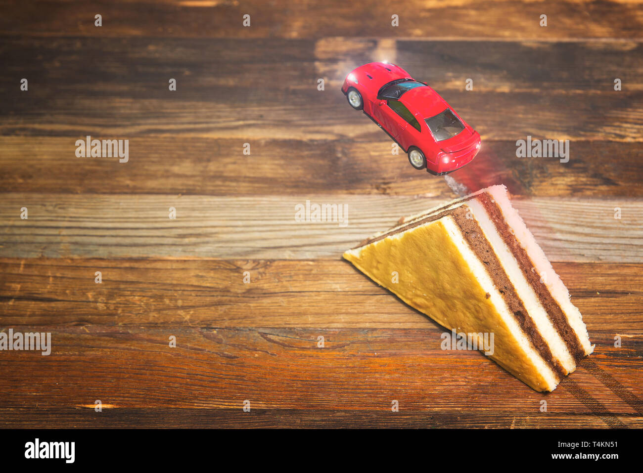 toy car jumping from the springboard i Stock Photo - Alamy