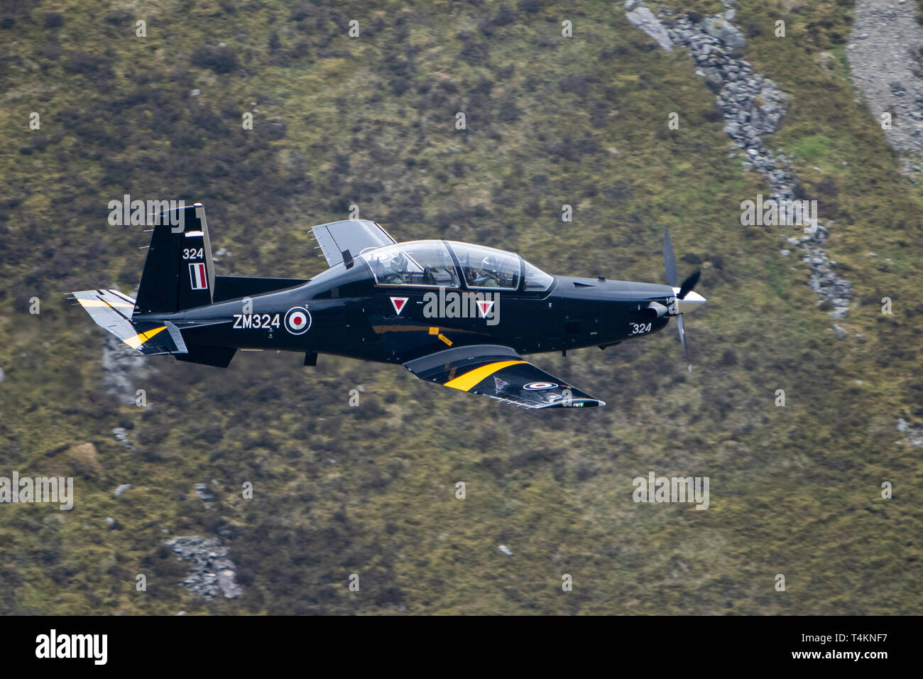 RAF T6 Texan takes a training flight through Mach Loop, Wales, UK at ...