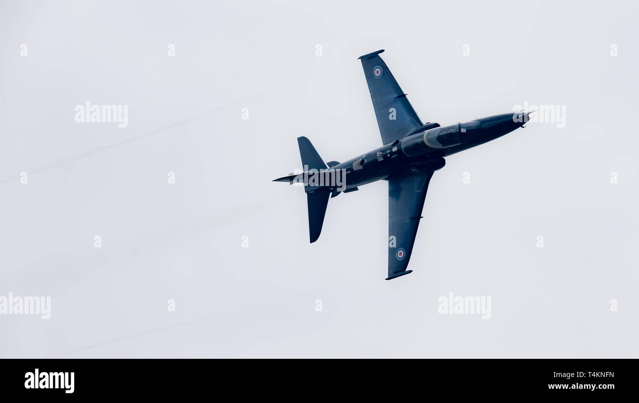 An RAF Hawk makes a training light through Mach Loop, Wales, UK Stock ...