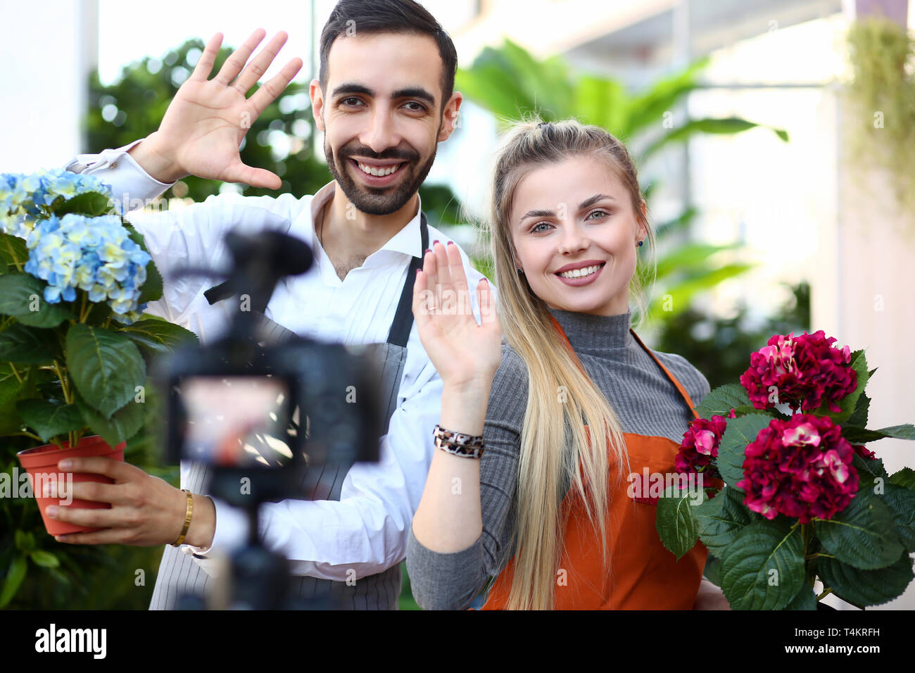 Young smiling family gardening hi-res stock photography and images - Alamy