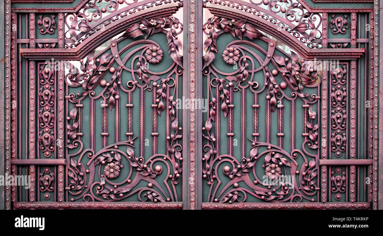 wrought-iron gates, ornamental forging, forged elements close-up Stock ...