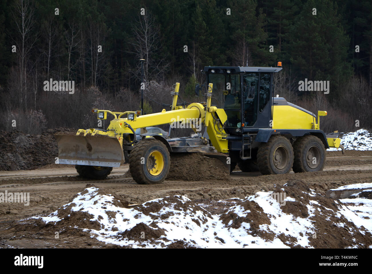 track-type bulldozer machine doing earthmoving work at sand quarry ...