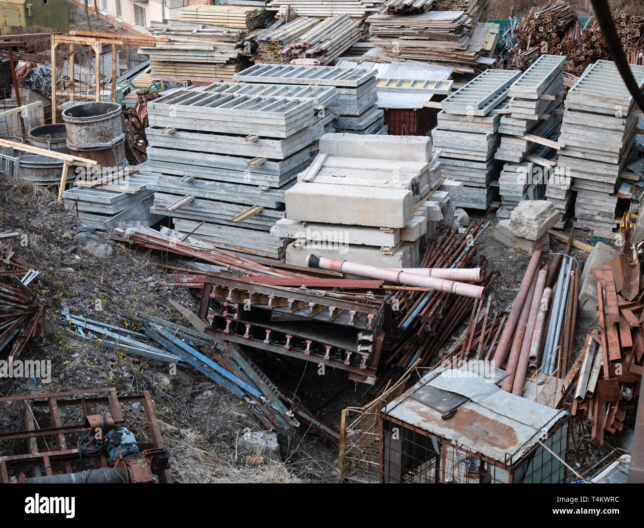 lot of building materials, concrete blocks, pipes, tubes at ...