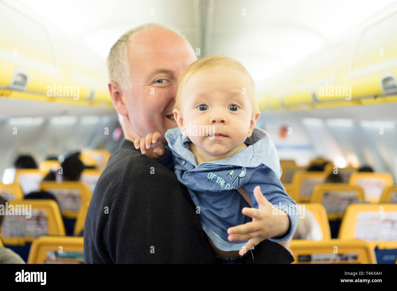 Plane boy seat hi-res stock photography and images - Alamy