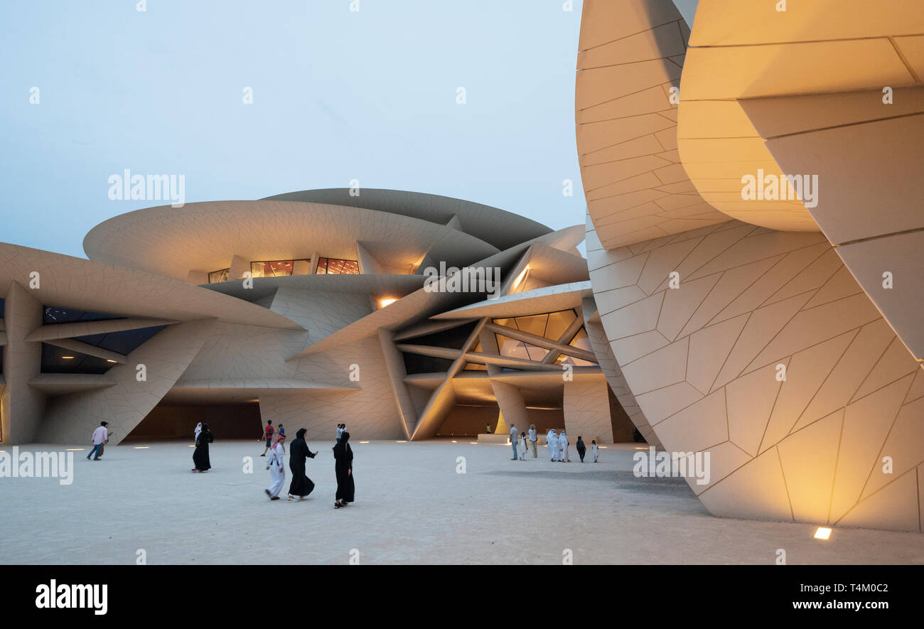 Dusk view of new National Museum of Qatar in Doha , Qatar. Architect ...