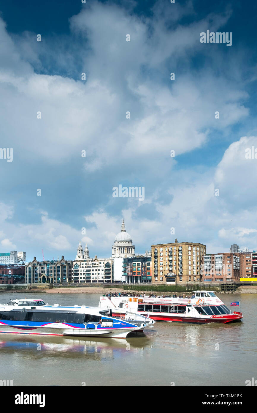 A Thames Clipper River Boat and a City Cruises sightseeing boat on the ...