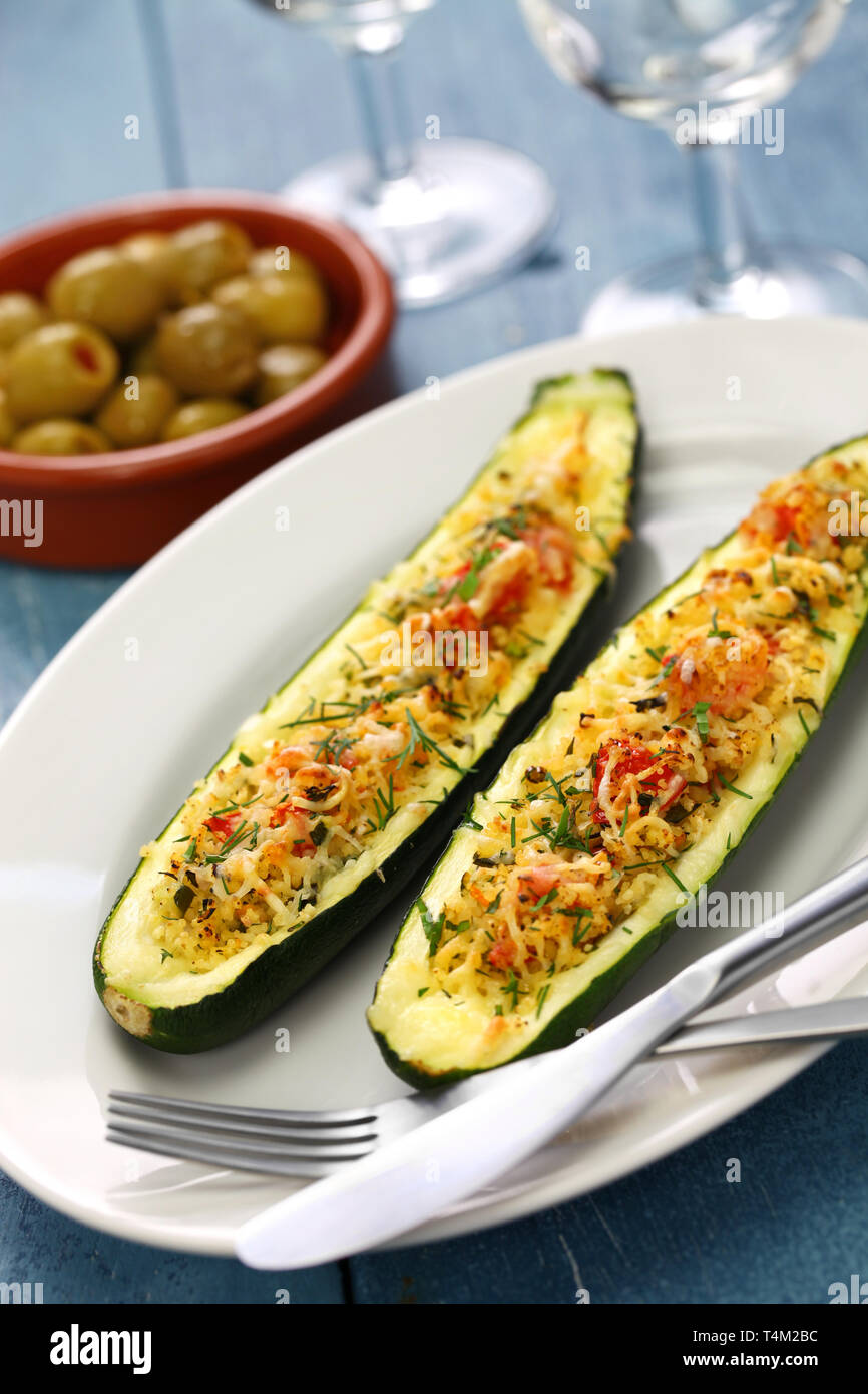 baked vegetarian zucchini boats, courgette farcie Stock Photo - Alamy