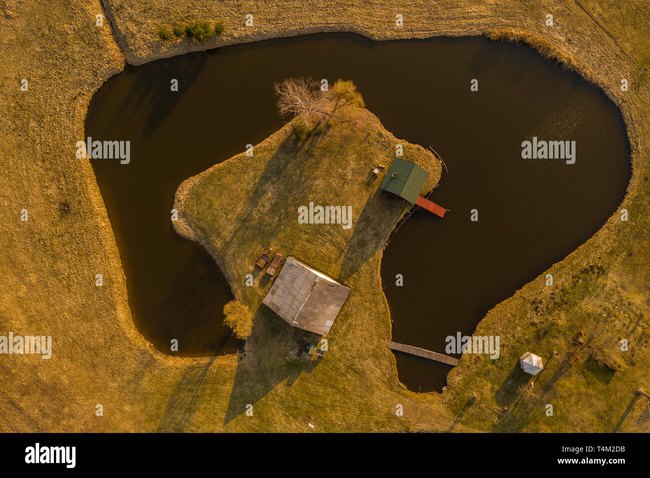 Flying drone over small lake hi-res stock photography and images - Alamy
