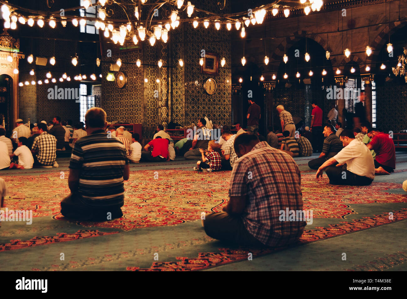 People praying inside the New Mosque Stock Photo - Alamy