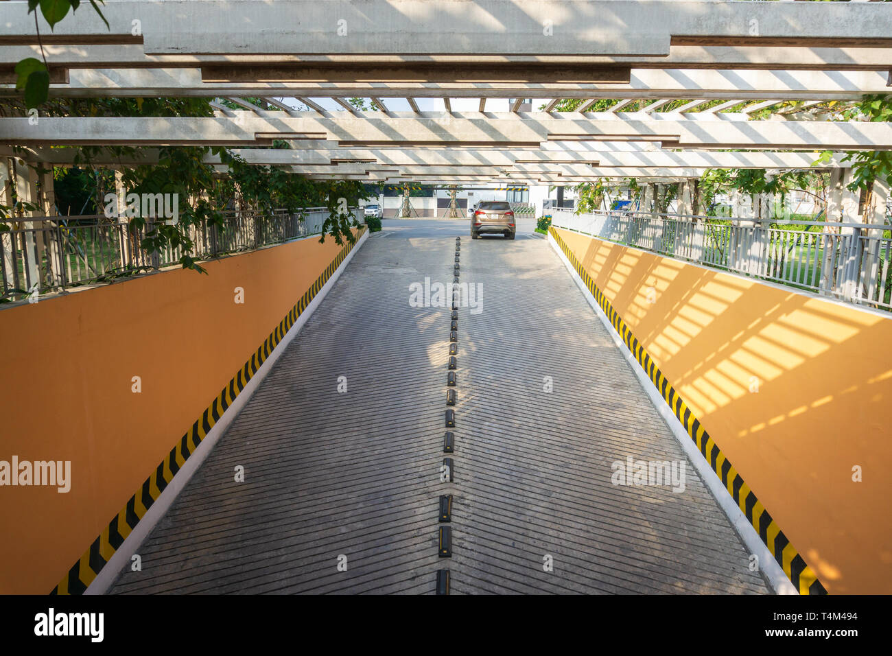 Concrete road ramp parking car garage, way up and down to car park ...