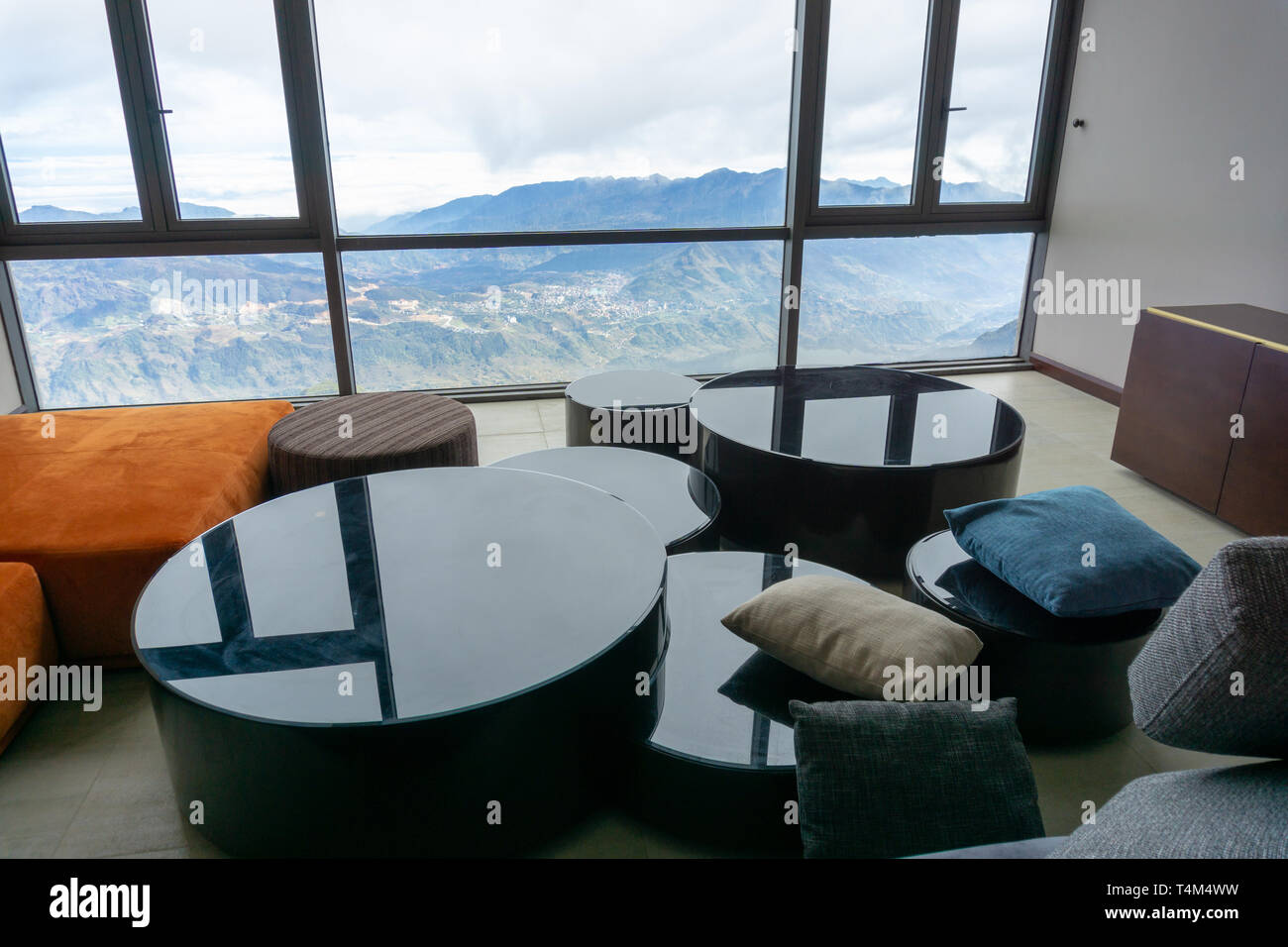 Hotel room with mountain landscape view from window, interiors with ...