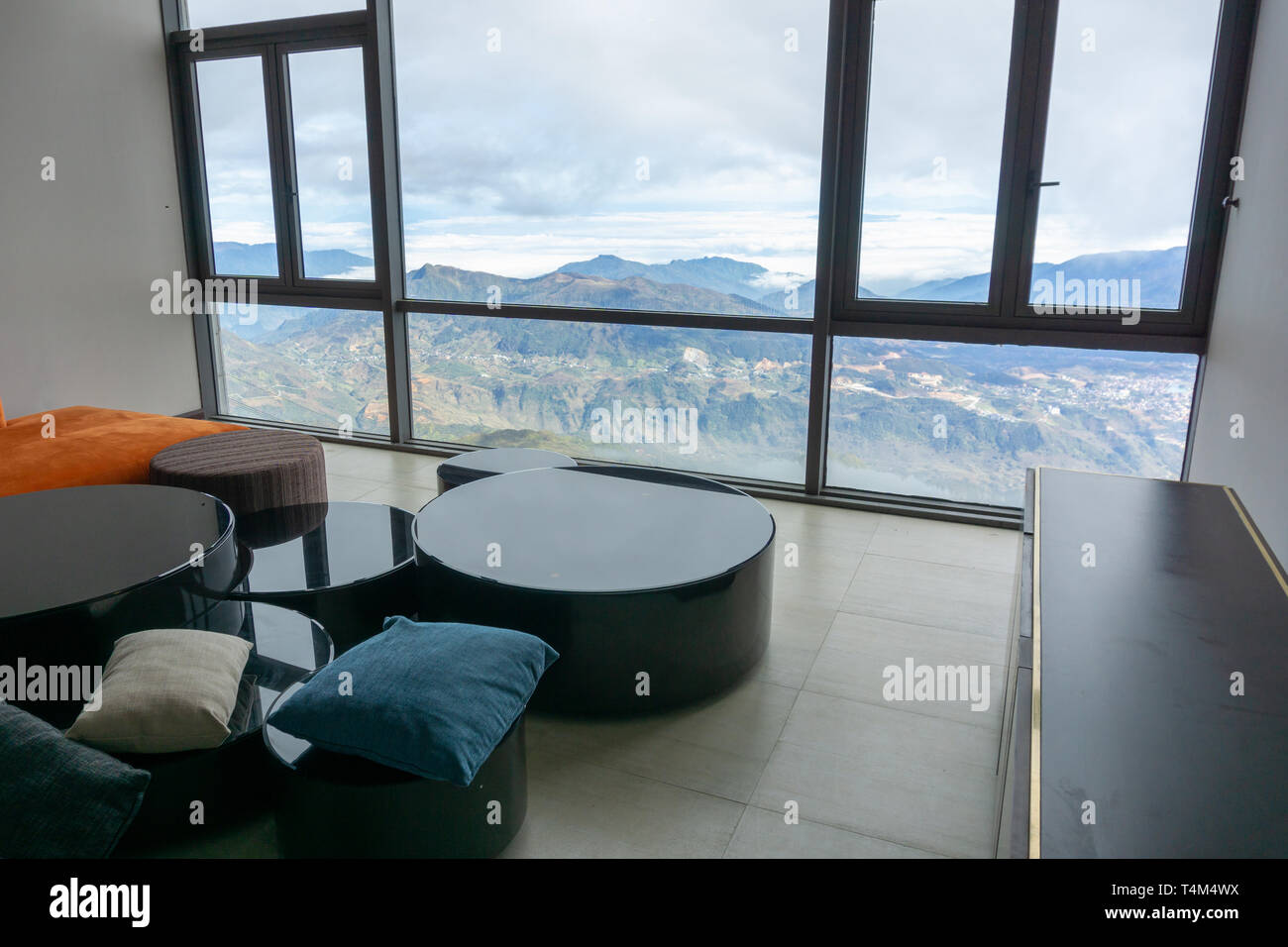 Hotel room with mountain landscape view from window, interiors with ...
