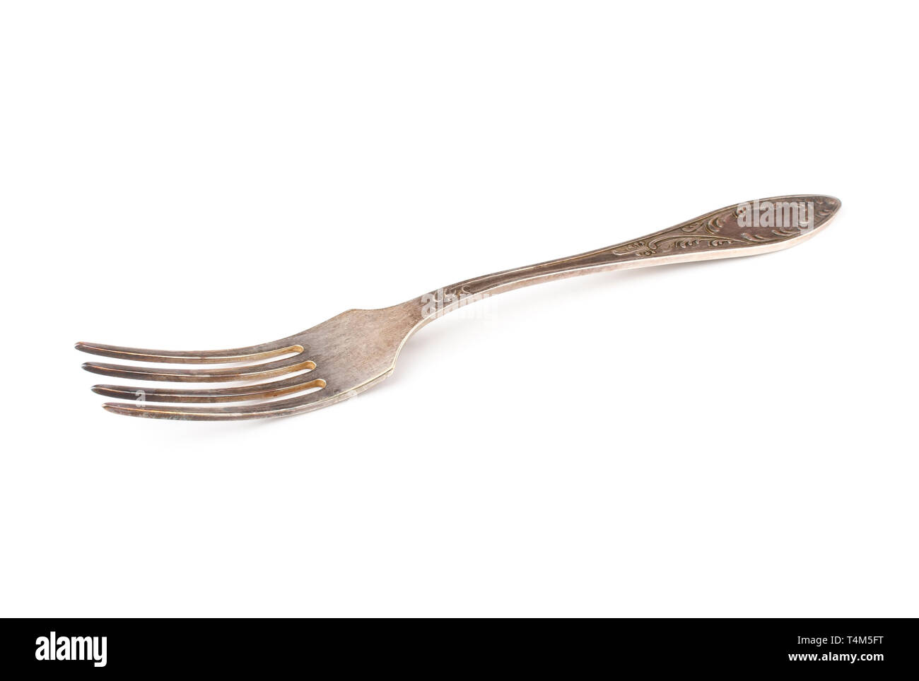 German silver fork closeup isolated on white background Stock Photo - Alamy