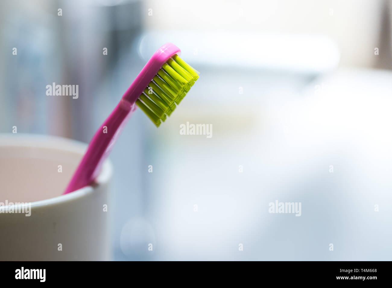 Colorful toothbrush in the bathroom, morning routine Stock Photo - Alamy
