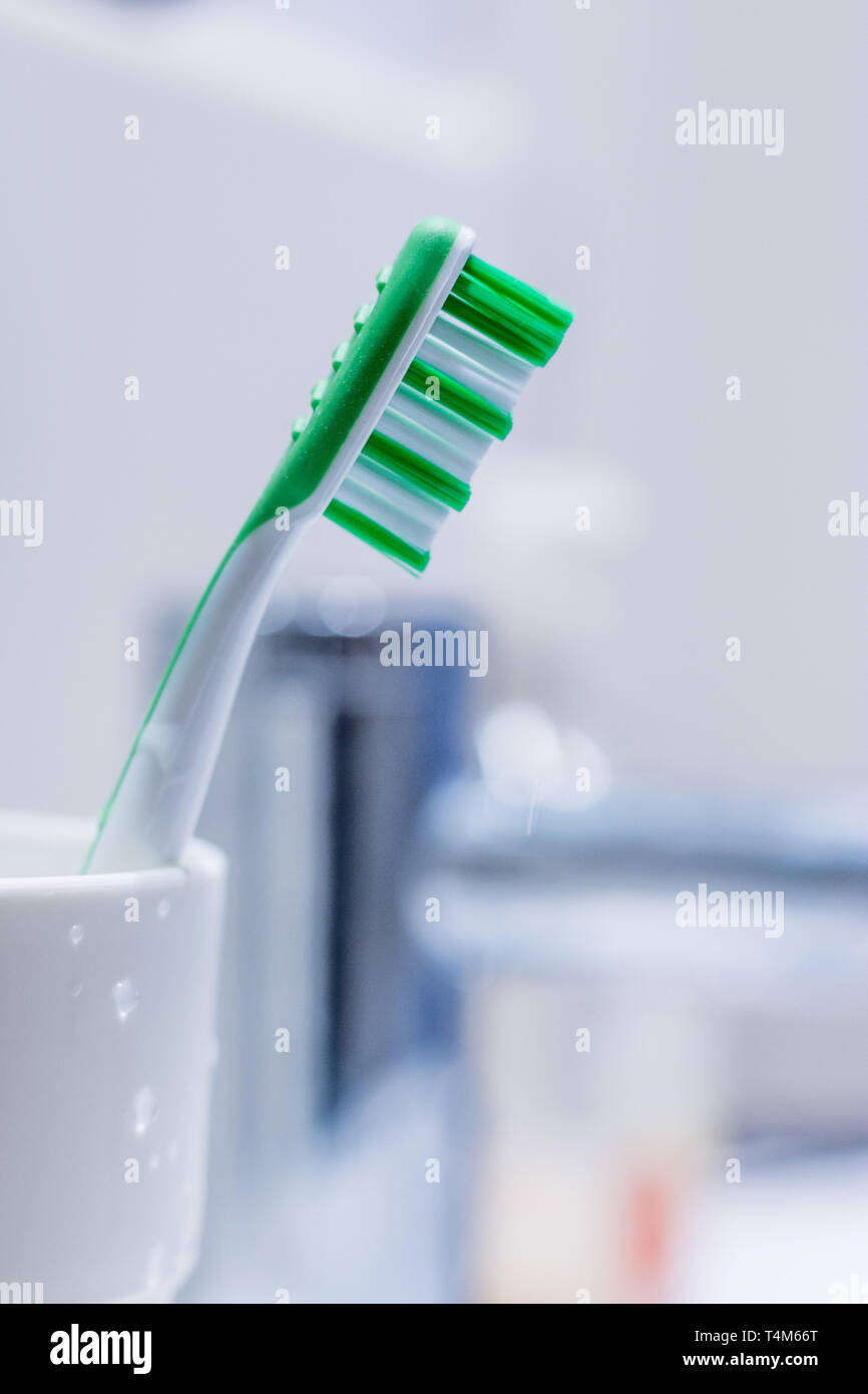 Colorful toothbrush in the bathroom, morning routine Stock Photo - Alamy