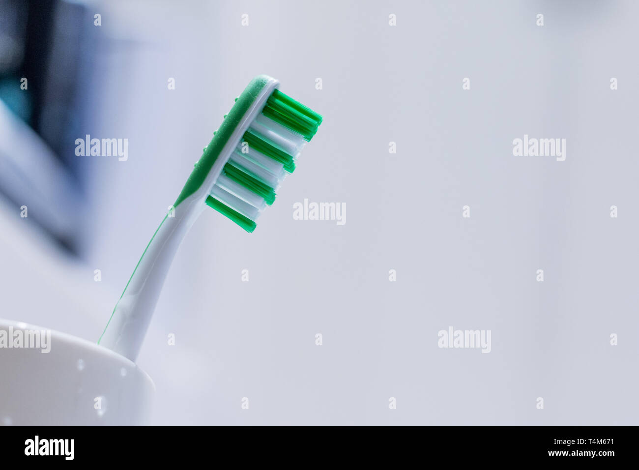 Colorful toothbrush in the bathroom, morning routine Stock Photo - Alamy
