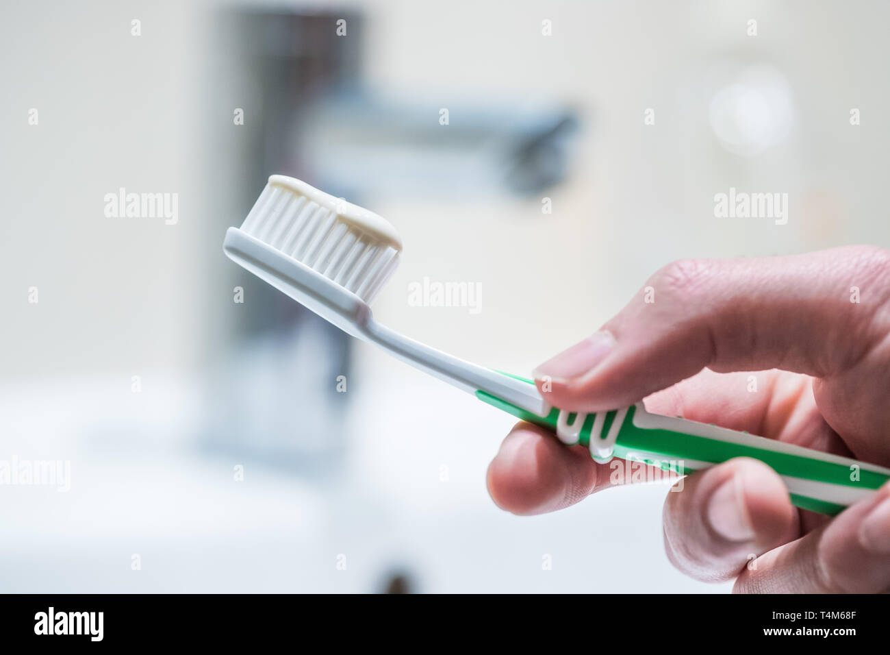 Colorful toothbrush in the bathroom, morning routine Stock Photo - Alamy
