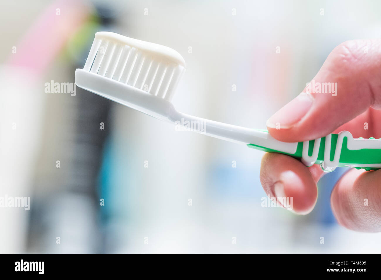Colorful toothbrush in the bathroom, morning routine Stock Photo - Alamy
