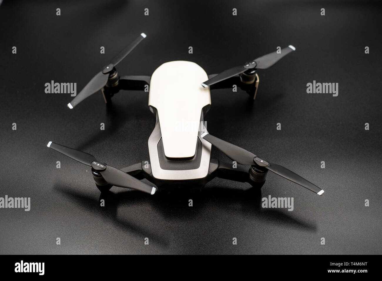 Drone - Flying in the dark, on black background. Closeup on dark ...