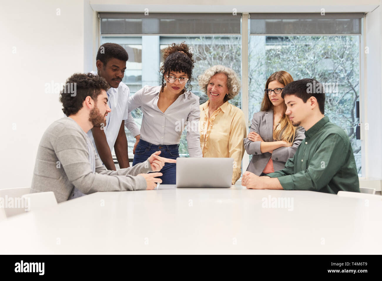 Start-Up Business Team At Laptop Computer At Meeting In Conference Room ...