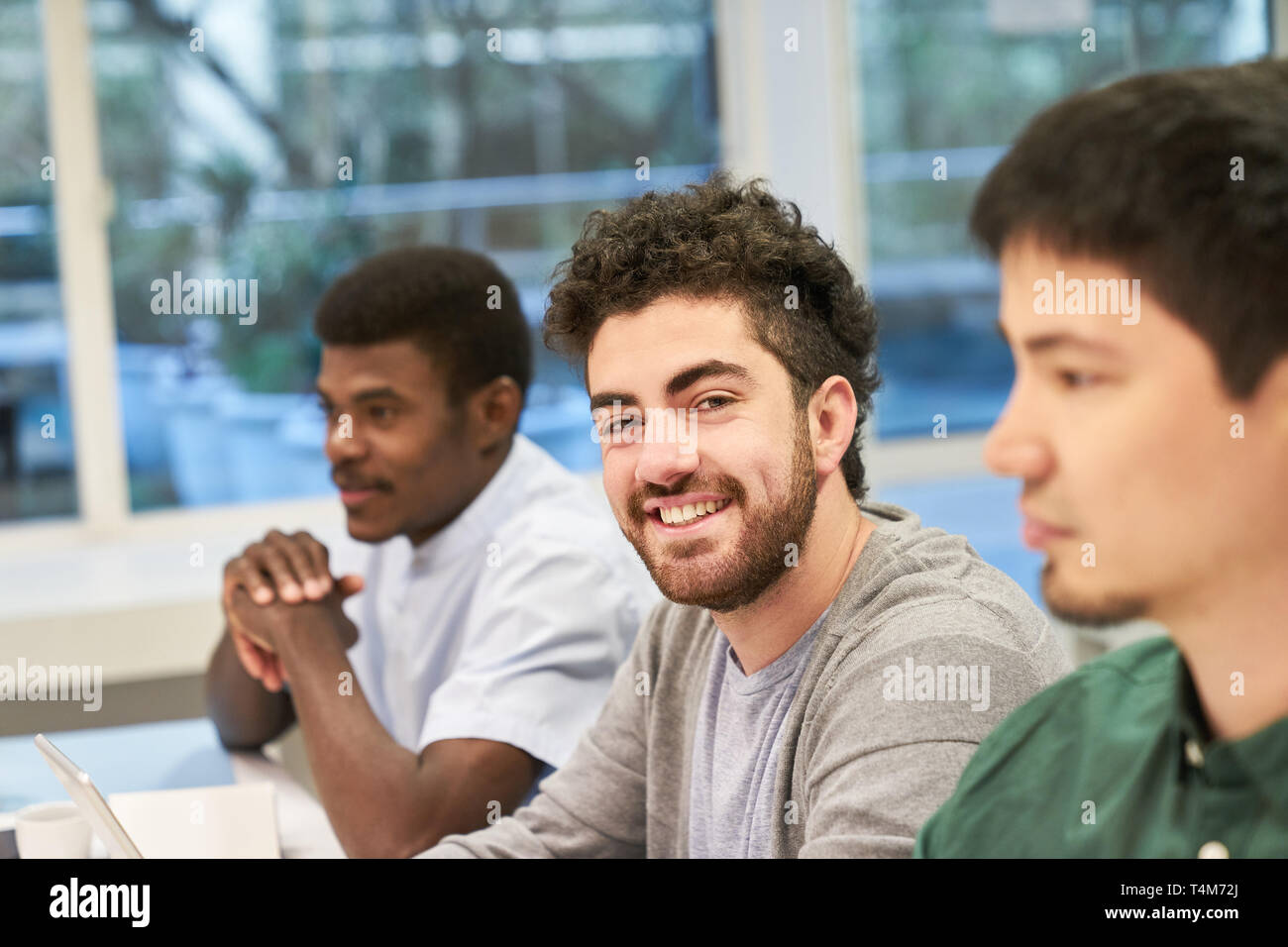 Young men training course hi-res stock photography and images - Alamy