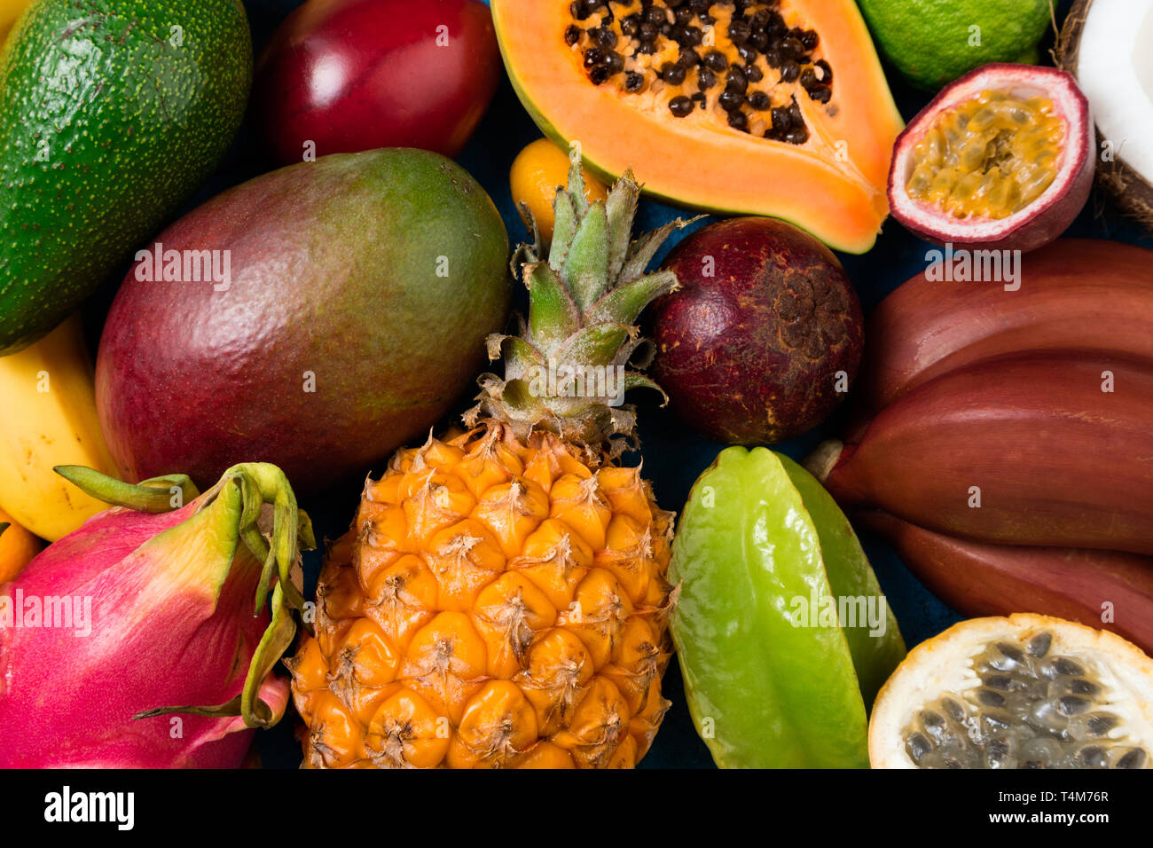 Summer tropical background with exotic various fruits closeup. Fruits ...