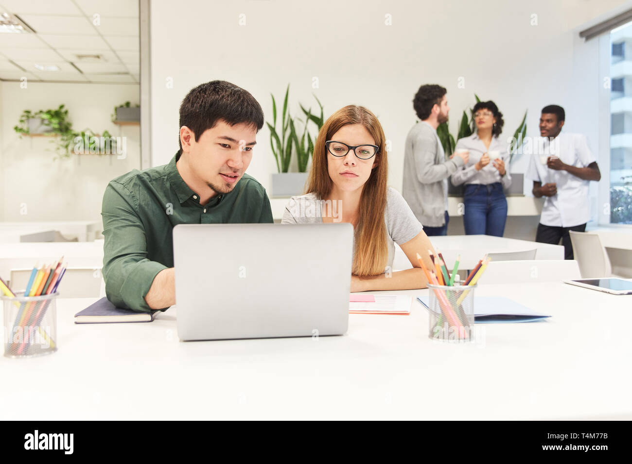 Developer team working laptop computer hi-res stock photography and ...