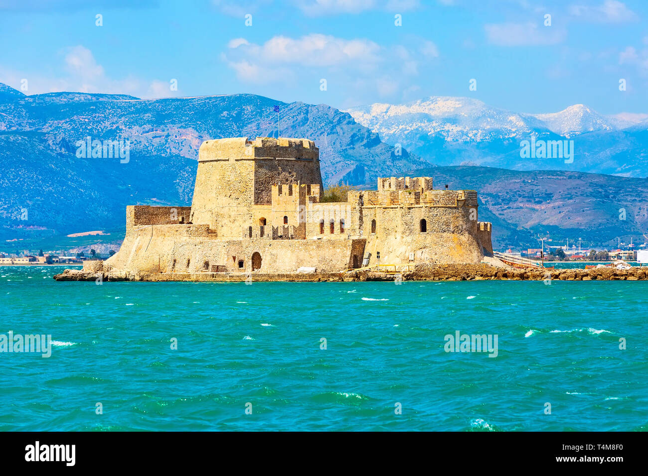 Bourtzi fortress in the sea in Nafplio or Nafplion and snow mountain ...