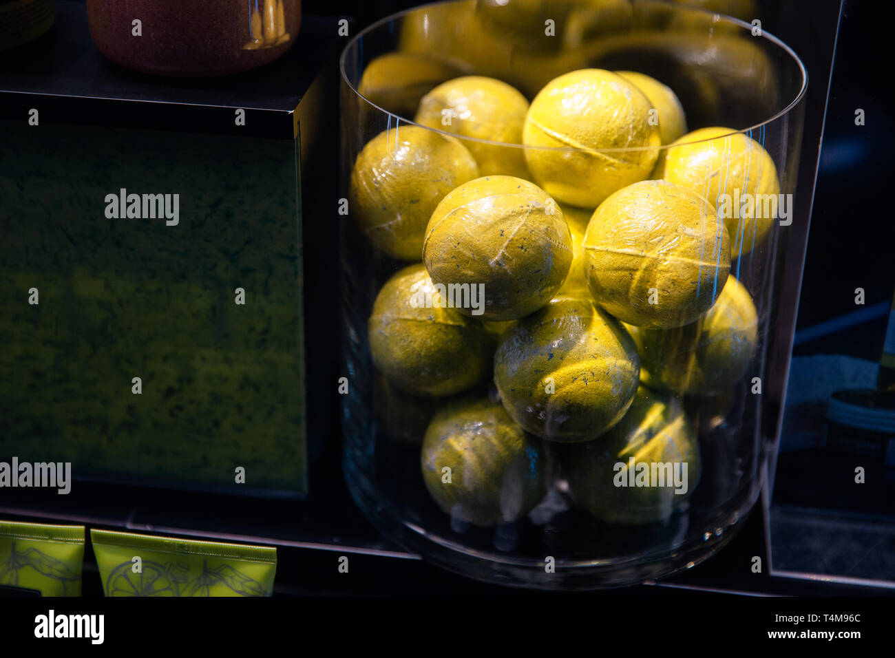 Tenniss balls at a shop display window Stock Photo - Alamy