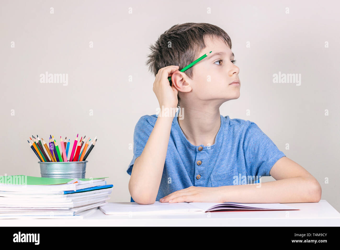 Pencil behind ear hi-res stock photography and images - Alamy