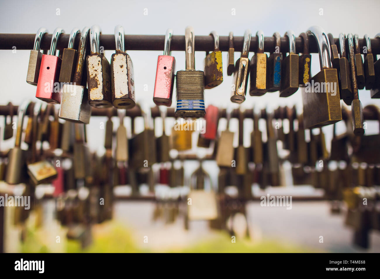 Symbolic love padlocks fixed to the railings bridge Stock Photo - Alamy