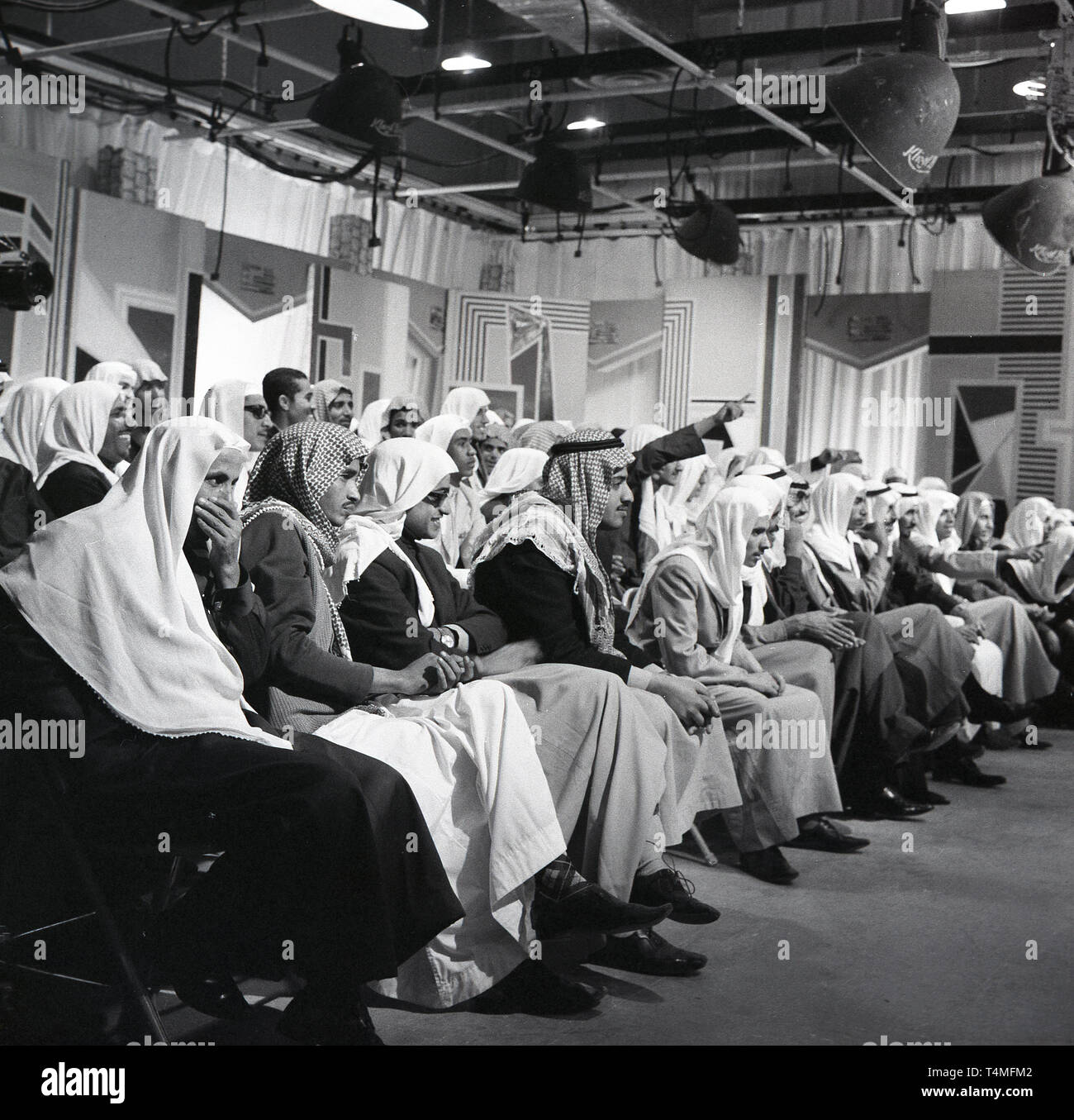 1960s, historical, television audience, saudi men in traditional arab ...