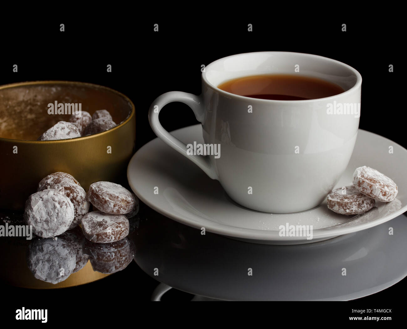 Tea with candies Stock Photo - Alamy