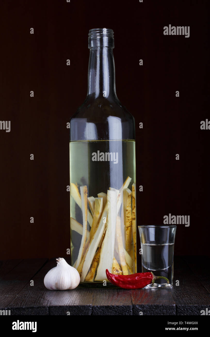 Herbal and spices flavored vodka Stock Photo - Alamy