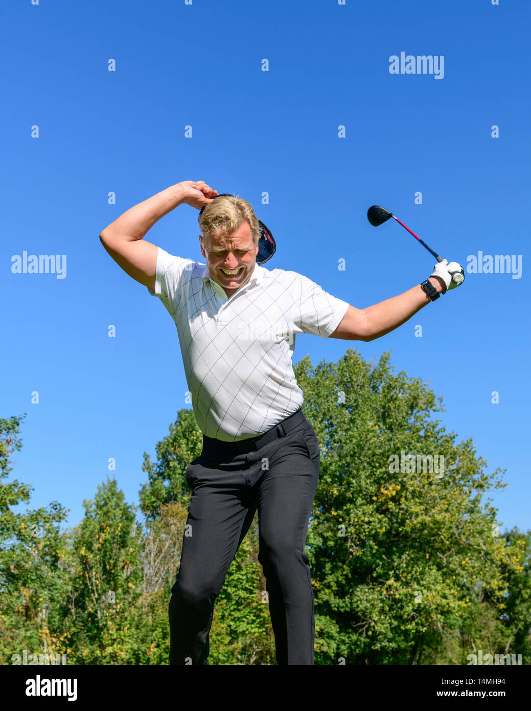 Ambitious elder golf player reacts emotional about his mishit Stock ...