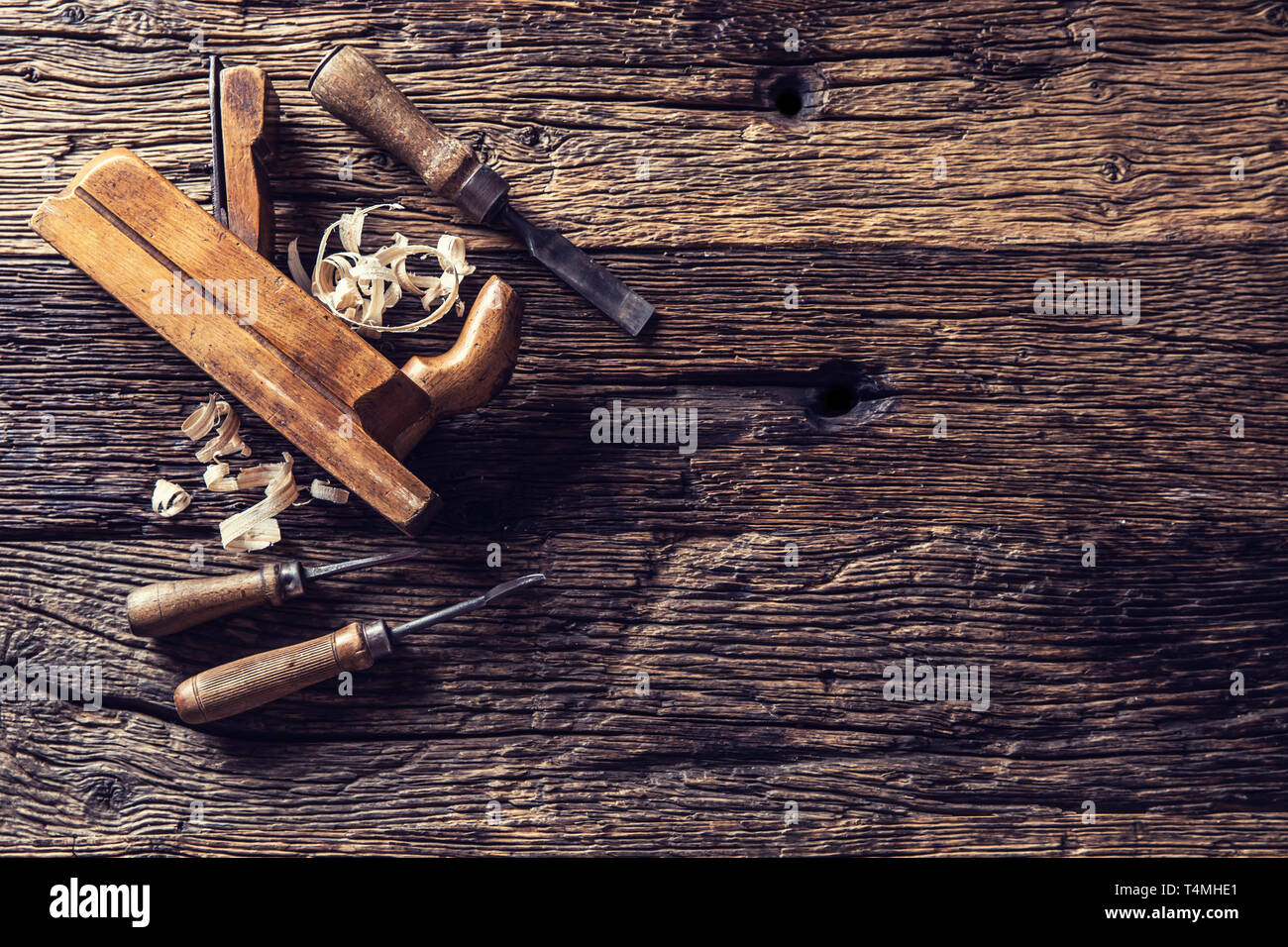 Top of view old planer and other vintage carpenter tools in a carpentry ...
